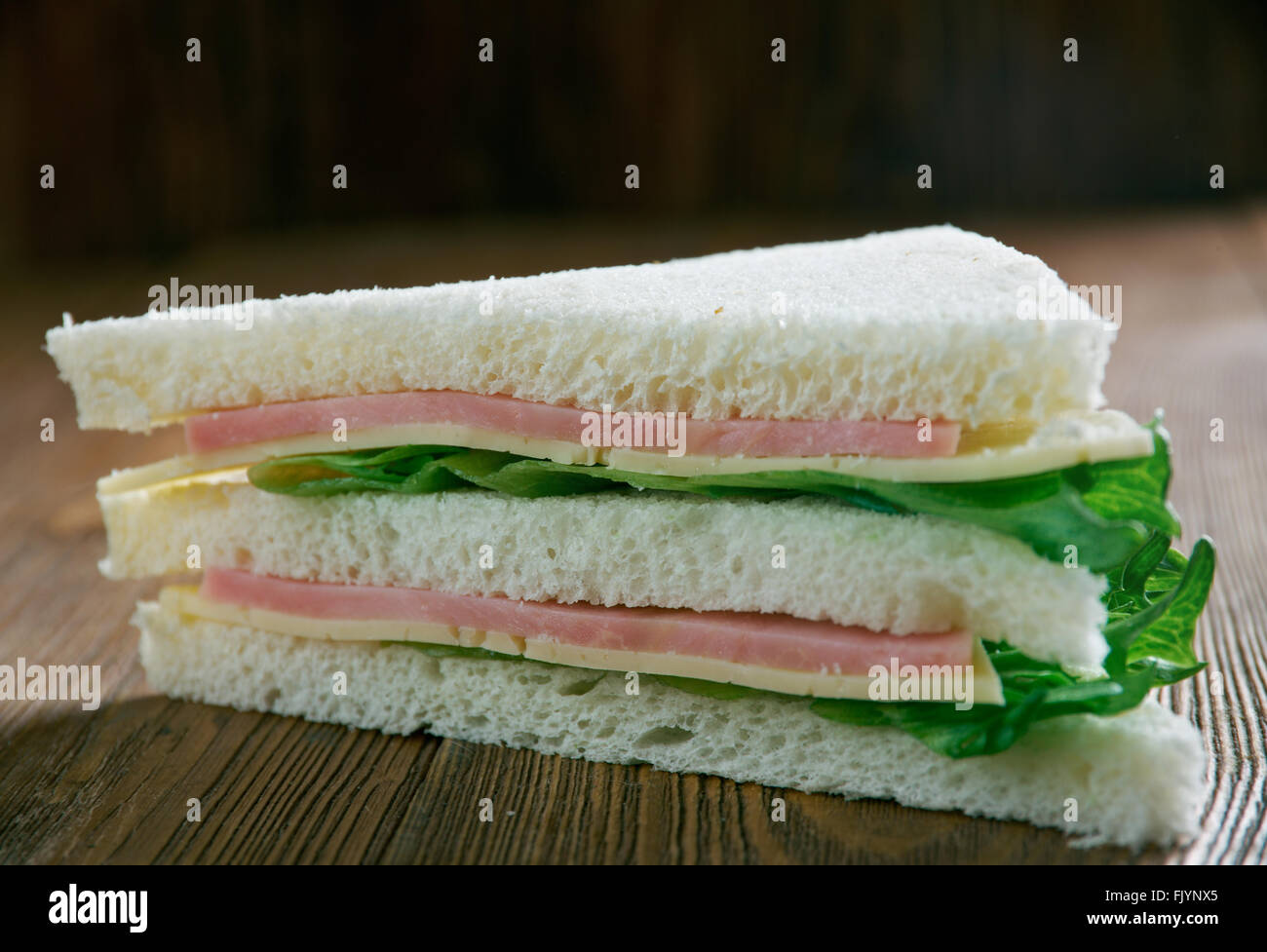 Tramezzino triangular sandwich constructed from two slices of soft ...