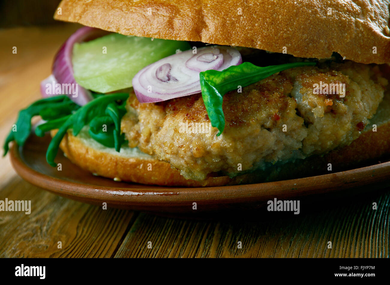 Balkan Burger with lettuce served .close up Stock Photo - Alamy