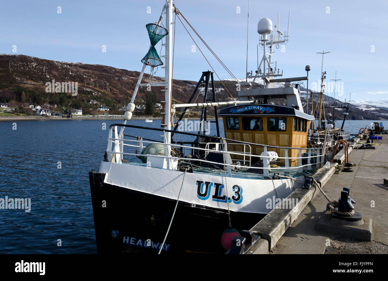 Fishing trawler in Ullapool Harbour in the Western Highlands of ...