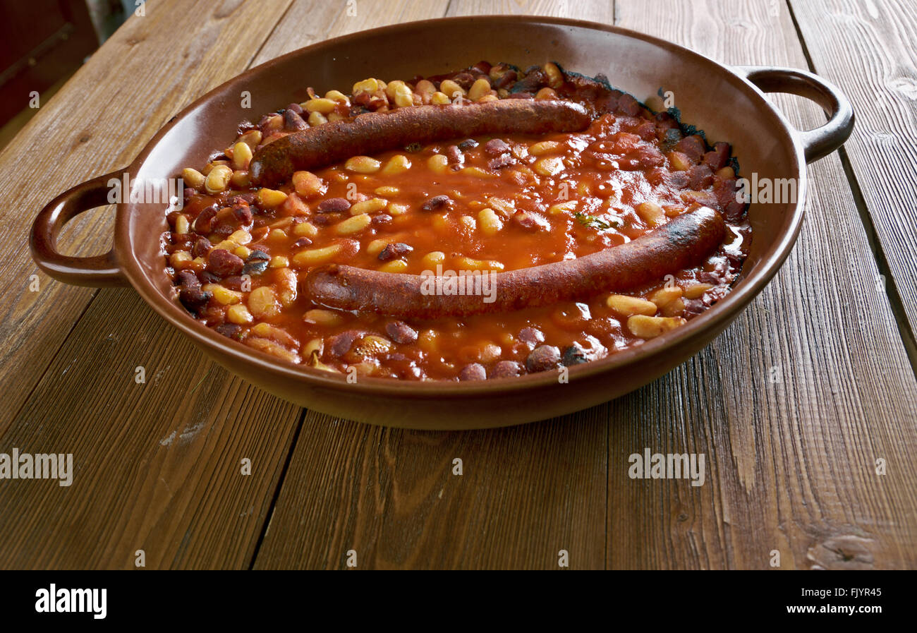 Tavche gravche traditional Macedonian dish.Baked beans with sausage ...