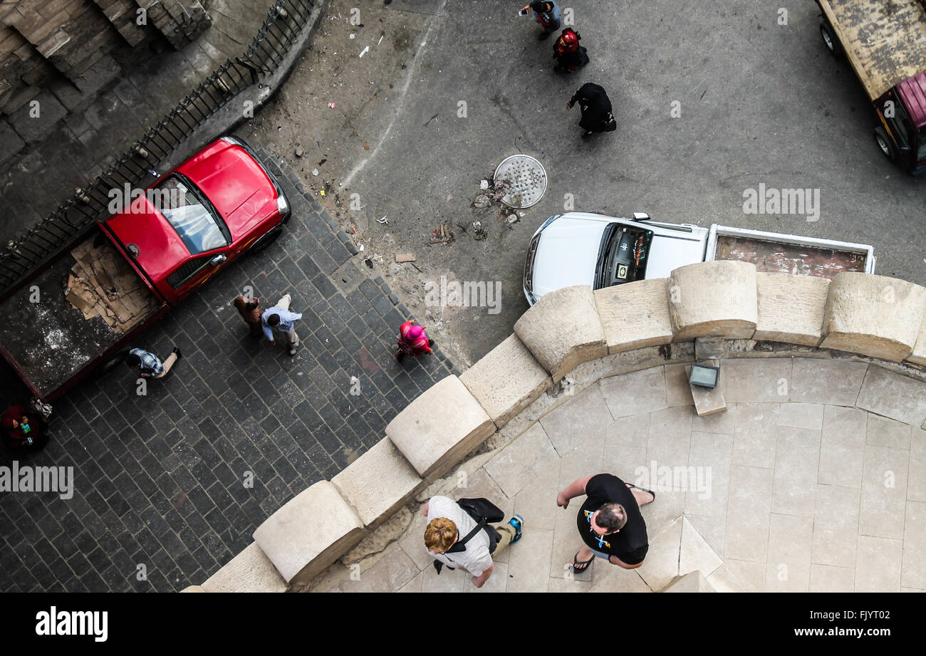 Cairo, Egypt. 04th Mar, 2016. Below a group of poor Egyptians walking ...