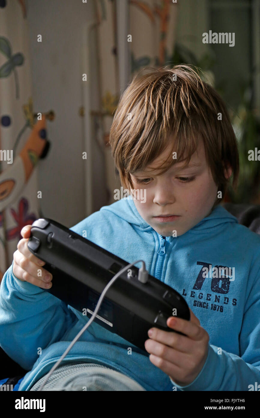 boy playing Wii U Stock Photo - Alamy