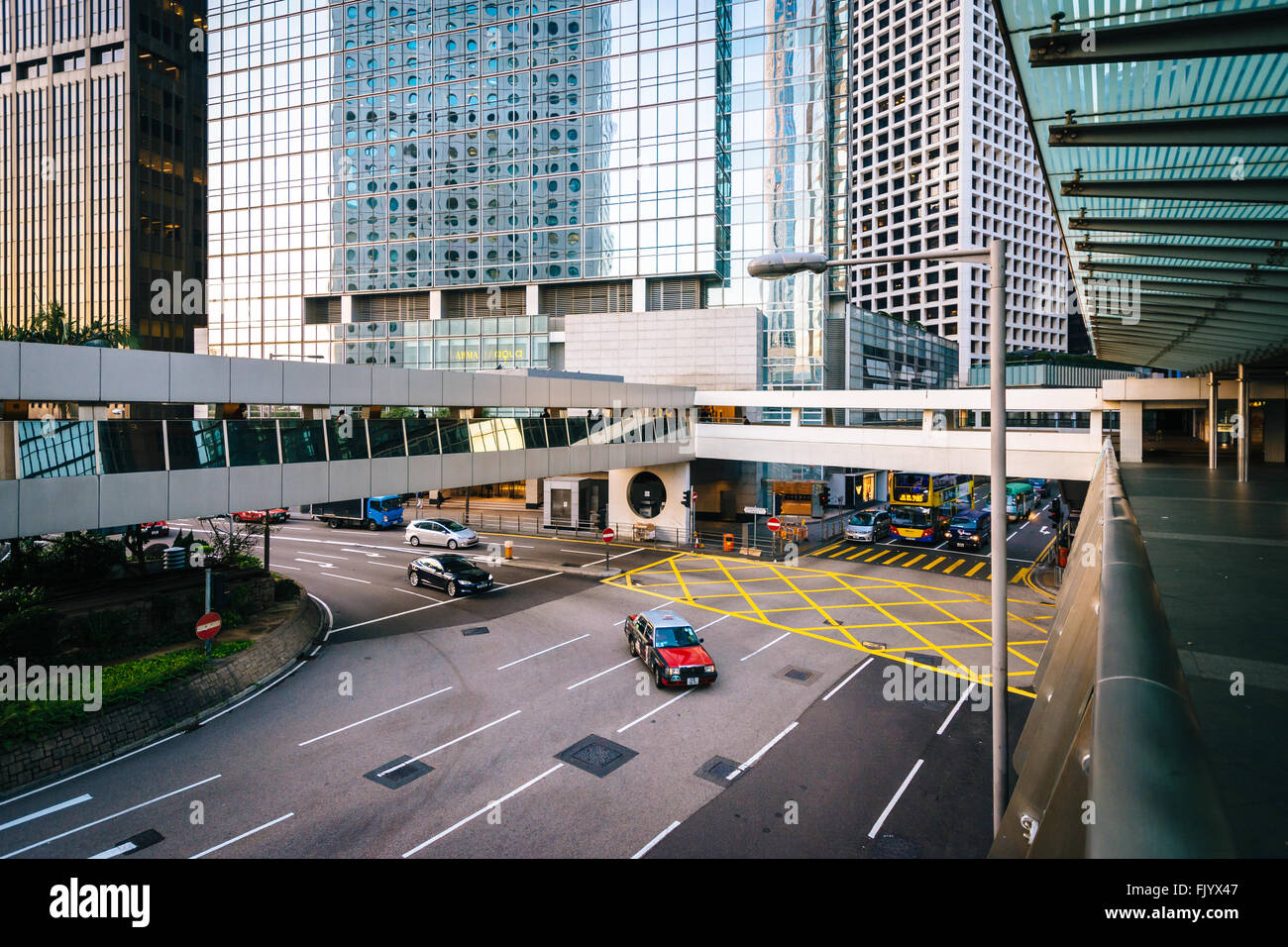Pedestrian walkways and modern skyscrapers at an intersection at ...