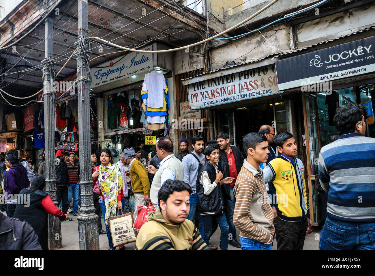 Street scene showing locals and tourists shopping in Old Delhi, India ...