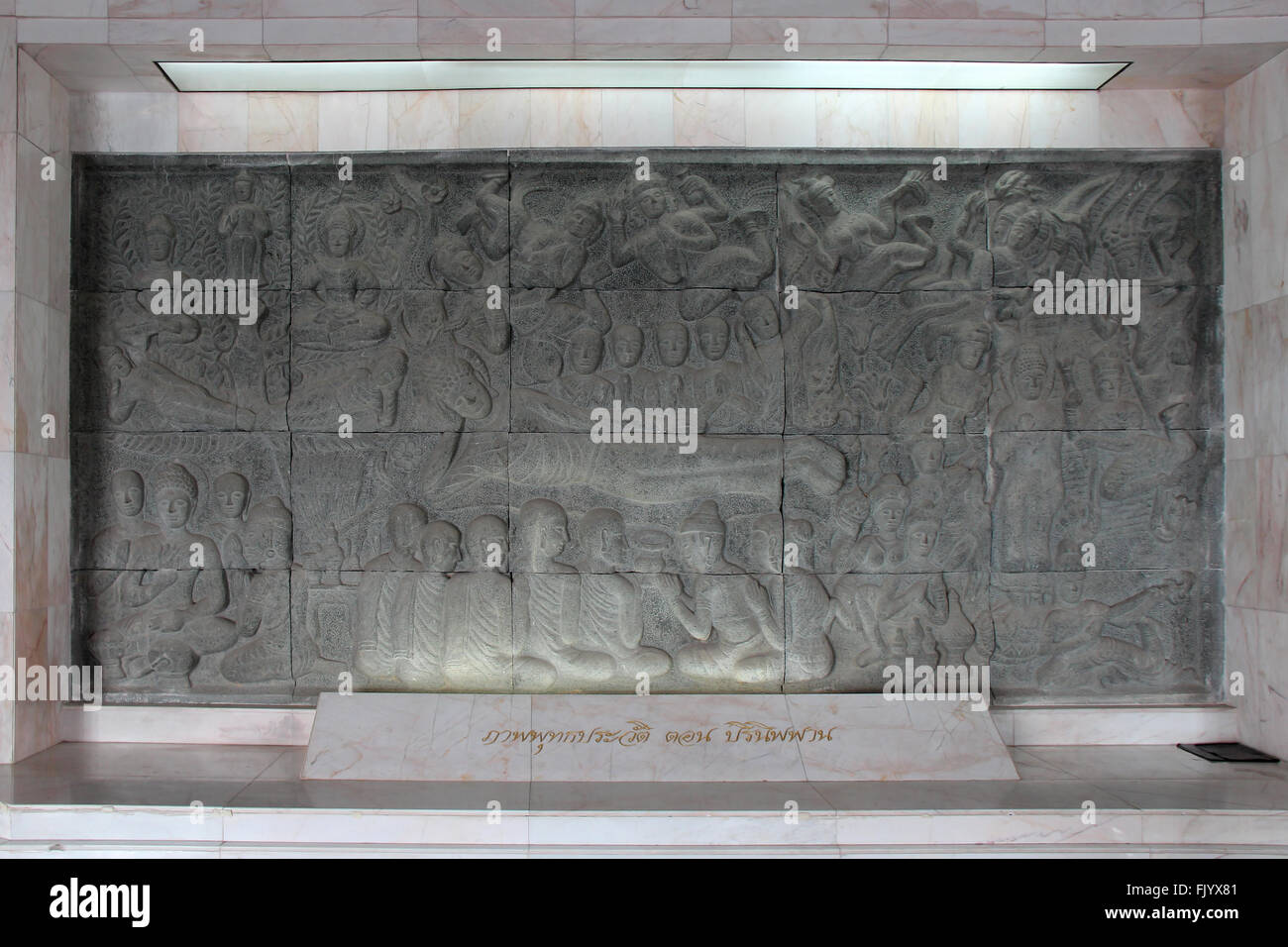 Sculptured Buddhist characters decorate a wall in a chedi in Doi ...