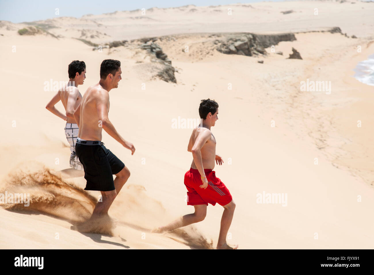 Brothers racing each others Stock Photo - Alamy