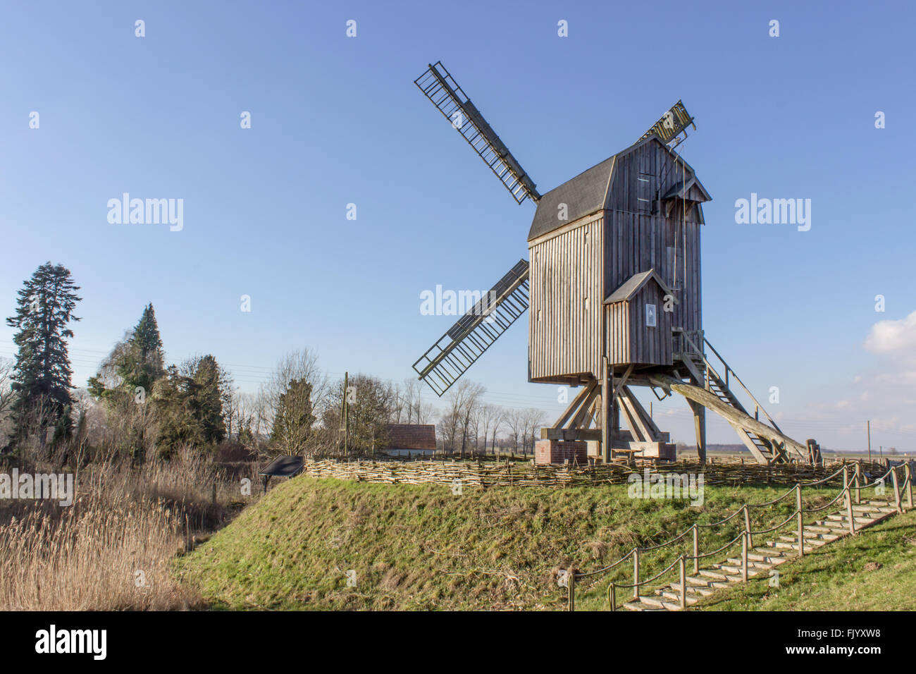 a Windmill on a hill Stock Photo - Alamy