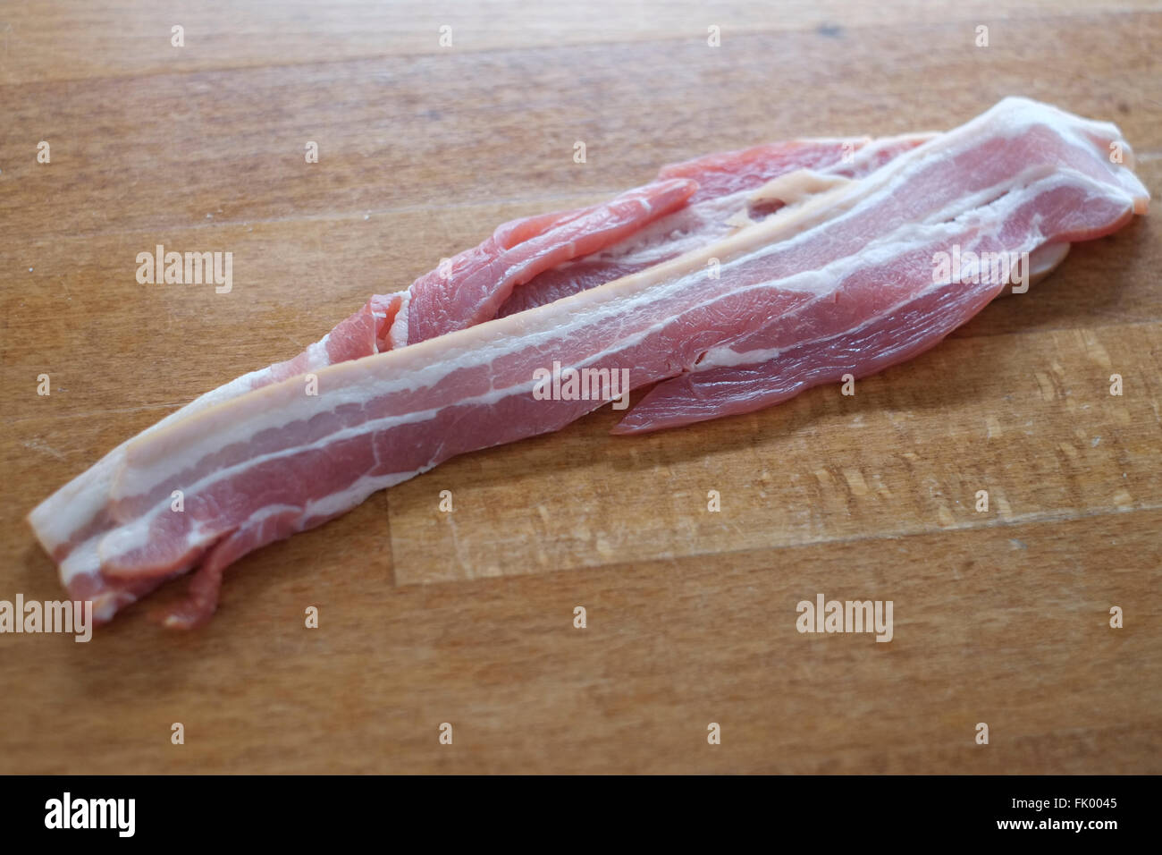 Slices of smoked streaky bacon Stock Photo - Alamy