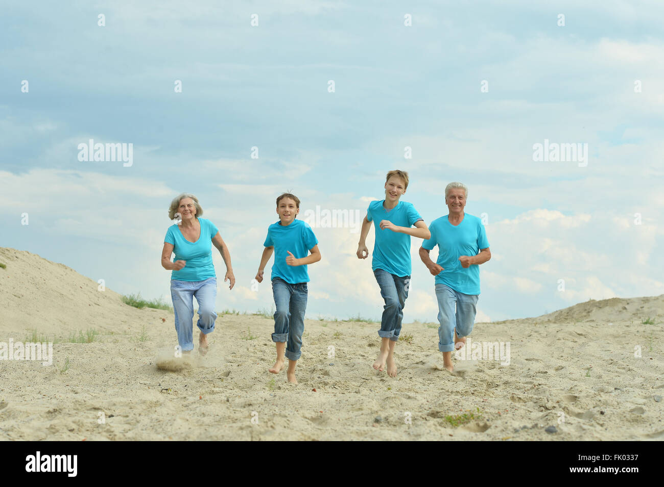 people on the sand Stock Photo - Alamy