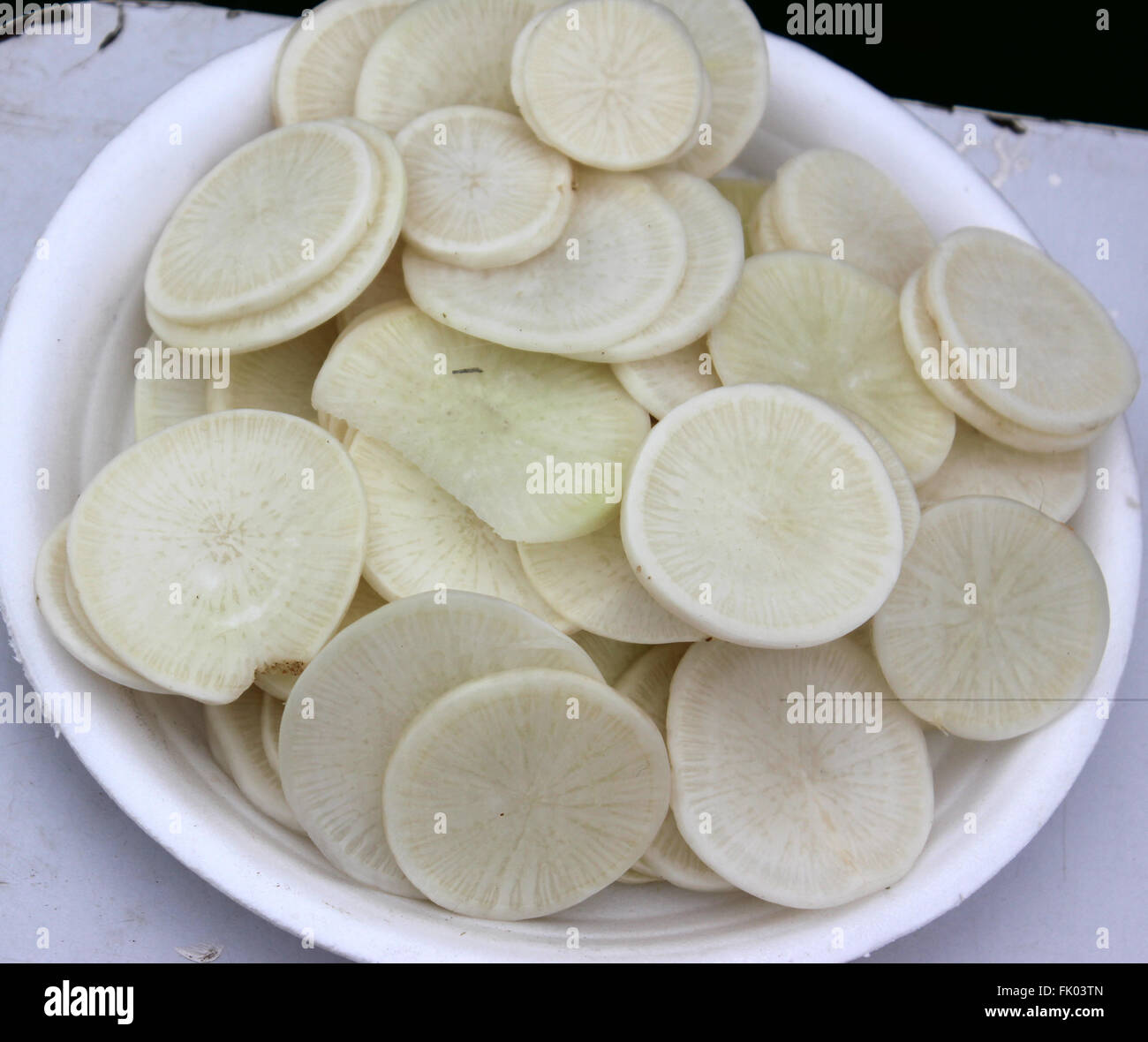 Sliced Pusa Shuka Radish, Raphanus sativus, family Brassicaceae ...