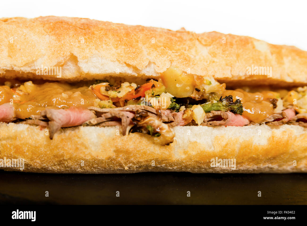 Close Up of Italian Sub Long Baguette with Ham Cheese Tomato and ...