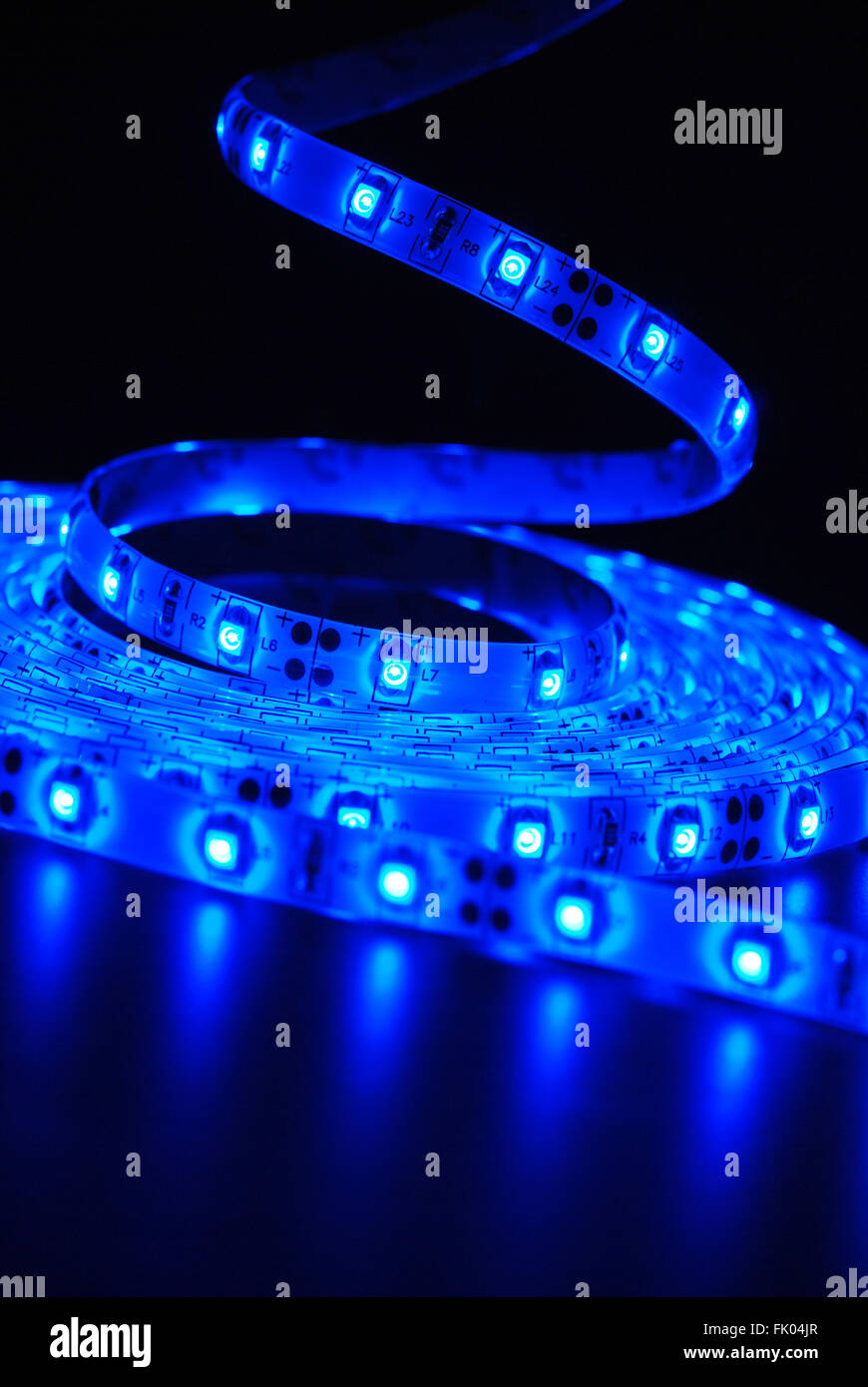 Blue led strip on the black background Stock Photo - Alamy