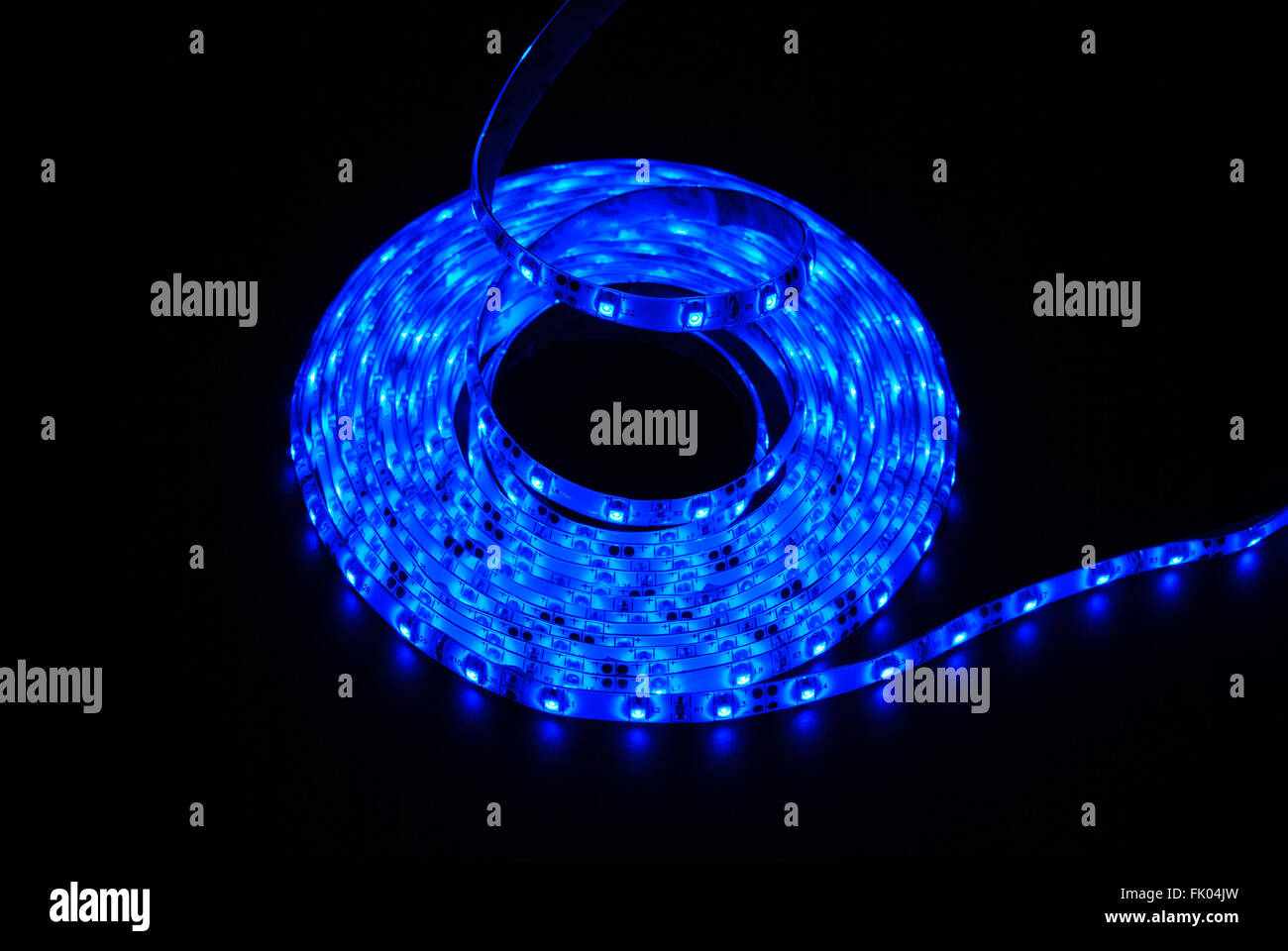 Blue led strip on the black background Stock Photo - Alamy