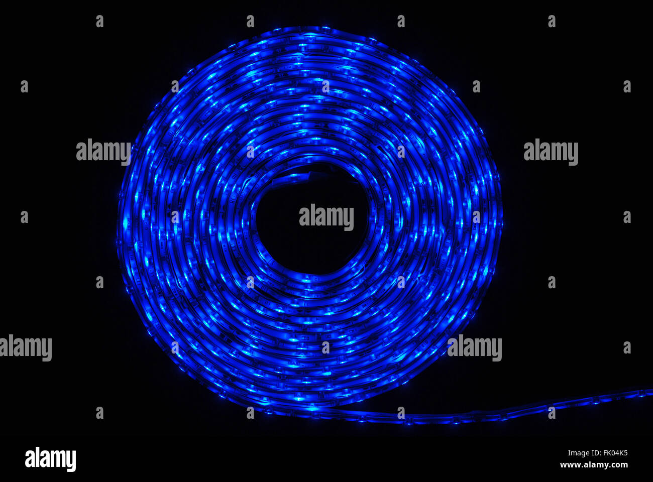 Blue led strip on the black background Stock Photo - Alamy