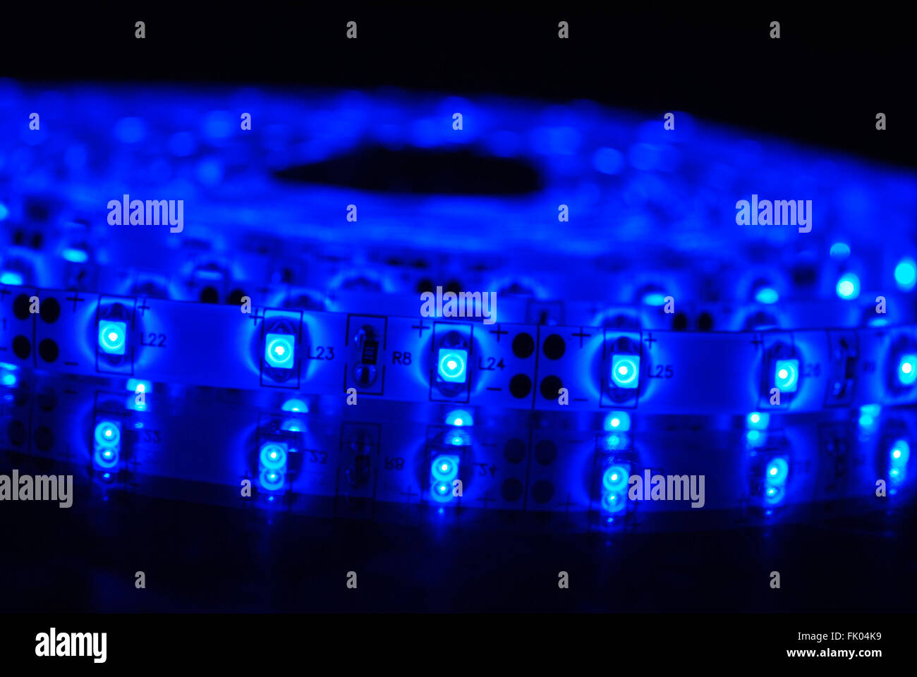 Blue led strip on the black background Stock Photo - Alamy