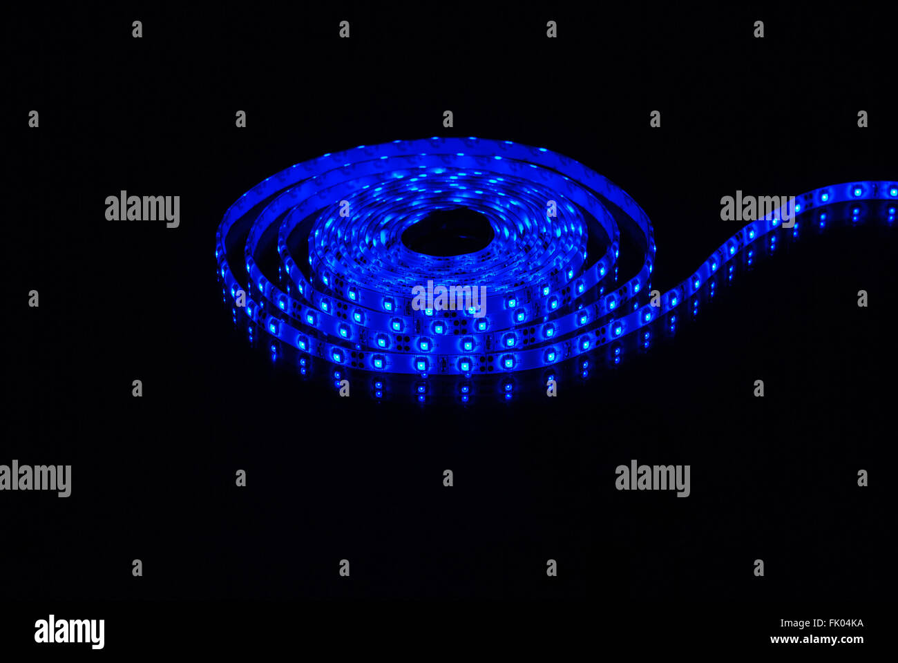 Blue led strip on the black background Stock Photo - Alamy