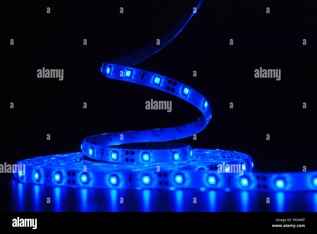 Blue led strip on the black background Stock Photo - Alamy