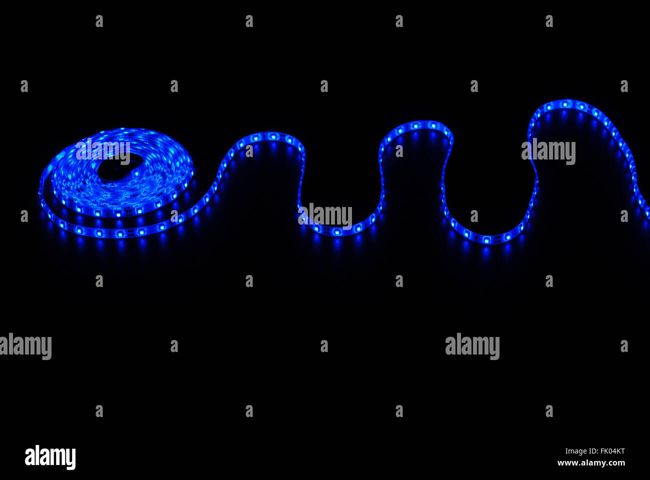Blue led strip on the black background Stock Photo - Alamy