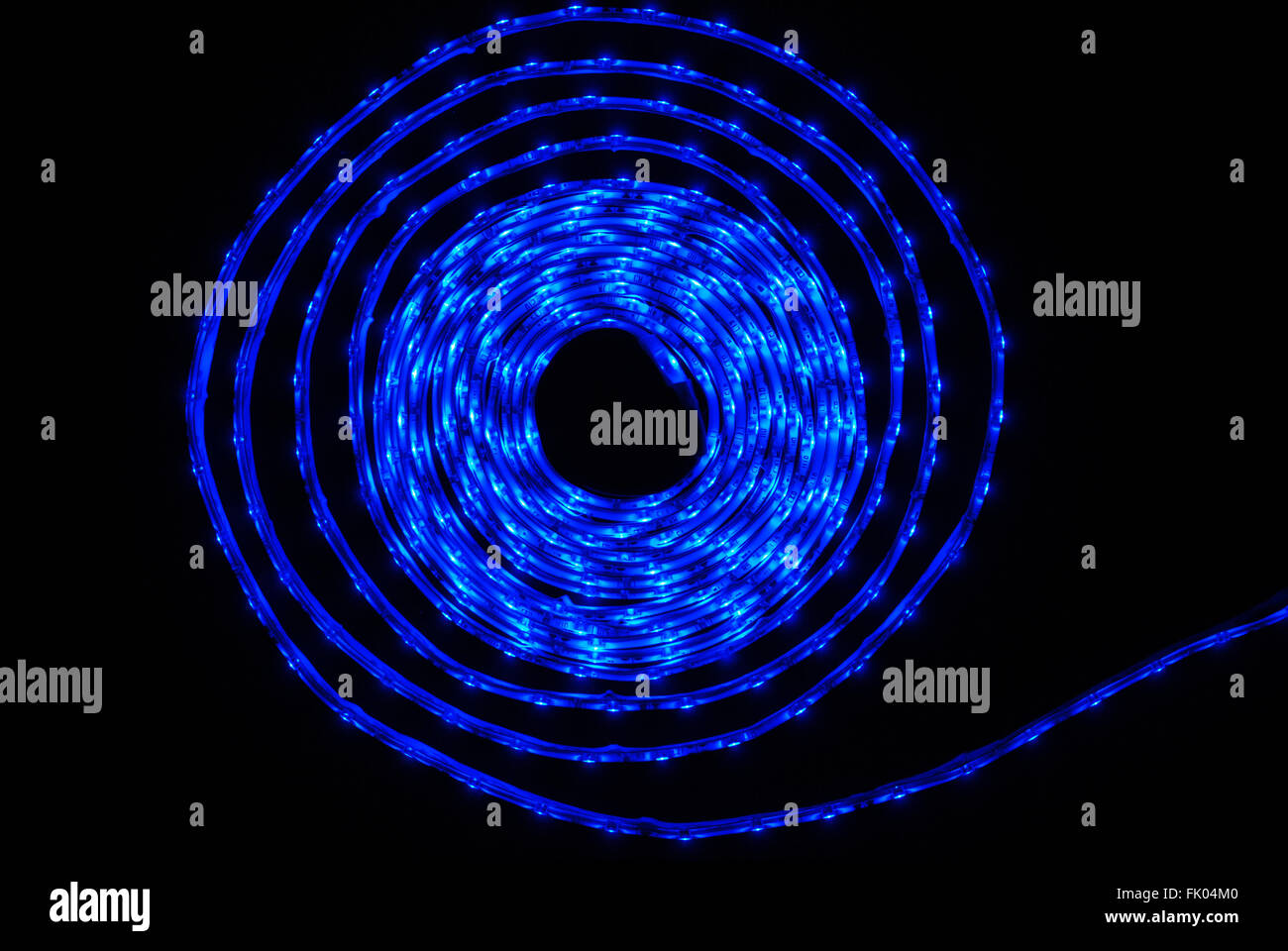Blue led strip on the black background Stock Photo - Alamy