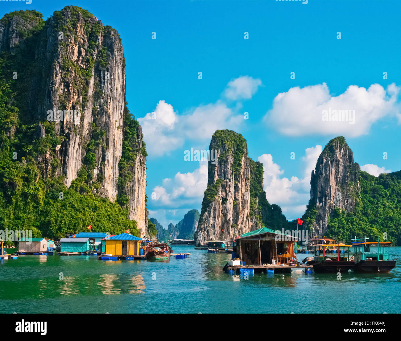 Floating village and rock islands in Halong Bay, Vietnam, Southeast ...