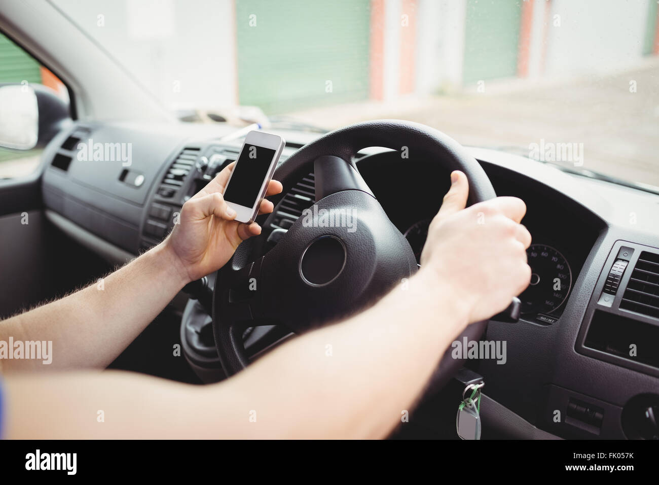 Delivery man driving his van Stock Photo - Alamy Delivery man driving his van Stock Photo - Alamy