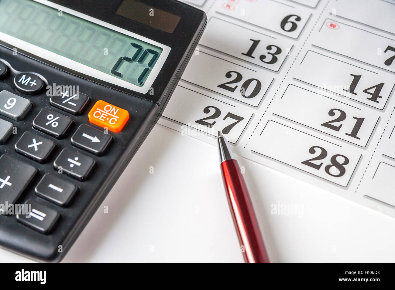 Calculator,Pen And Calendar on white background Stock Photo - Alamy