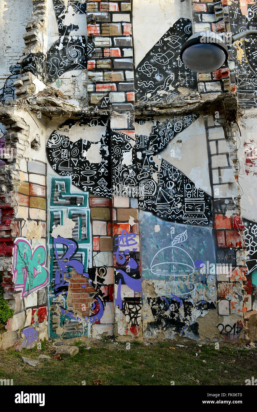 Colourful graffiti enlivens a ruined house at the end of Strada Berzei ...