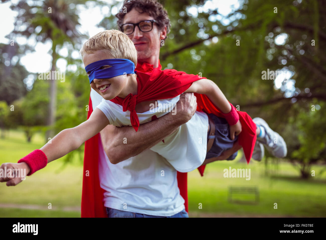 Father and son dressed as superman Stock Photo - Alamy