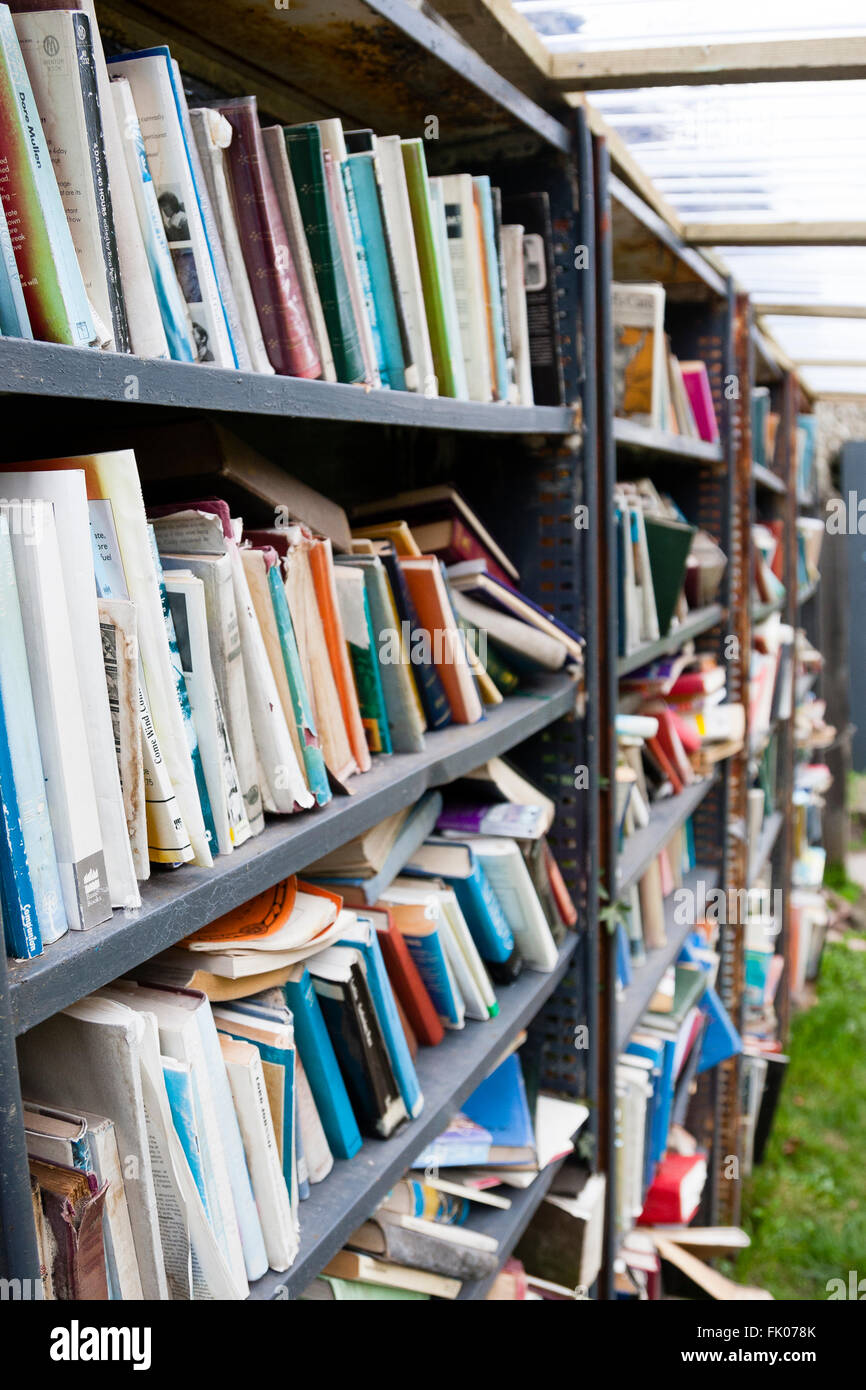 Hay-on-Wye, Wales, UK. Books for sale on shelf at unmanned book stall ...