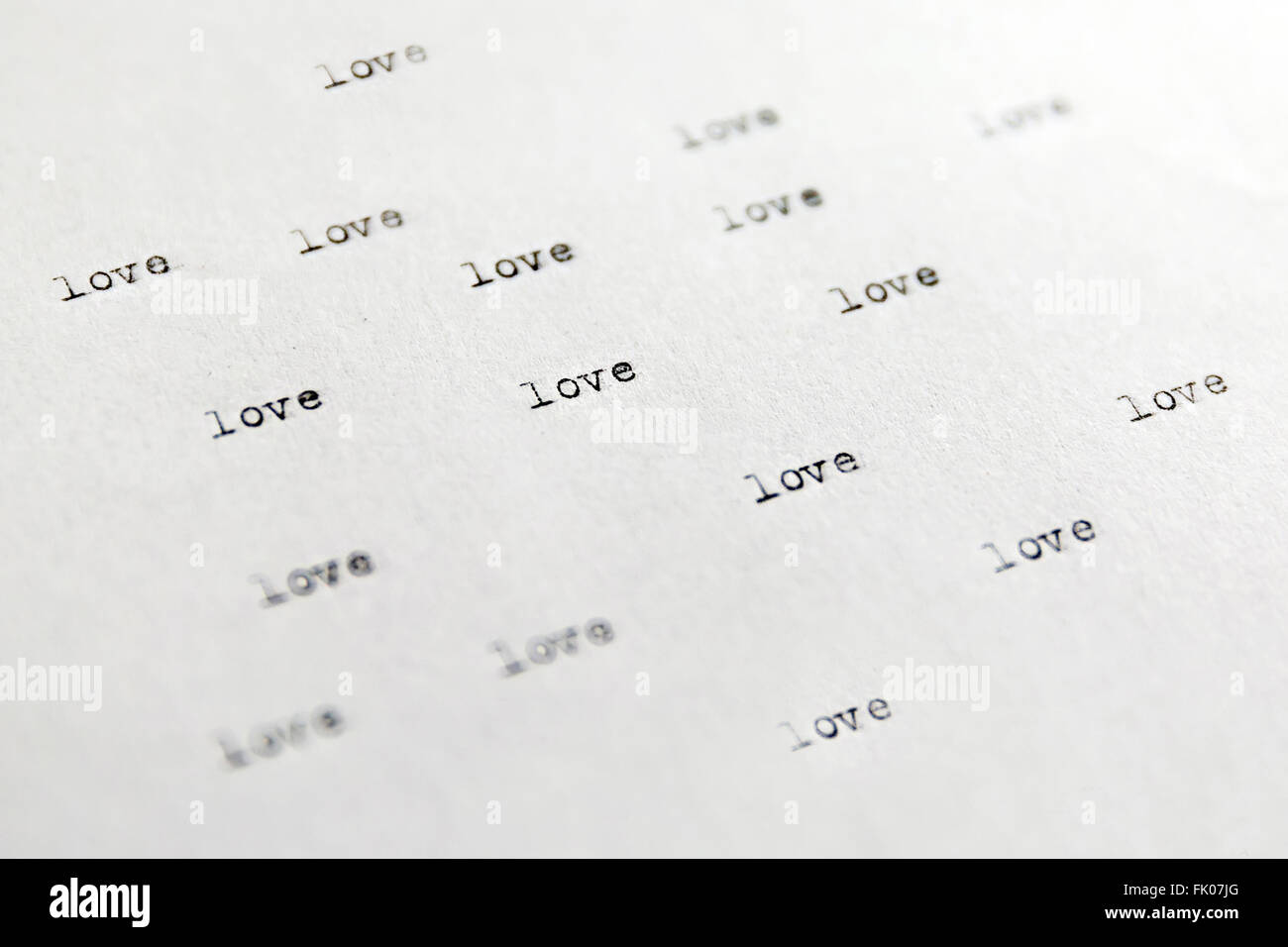 word "love" typed on a sheet of paper Stock Photo - Alamy