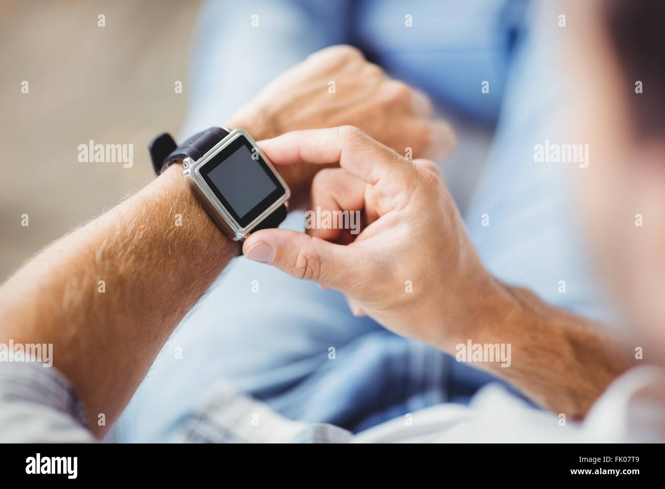 man wearing smart watch Stock Photo - Alamy