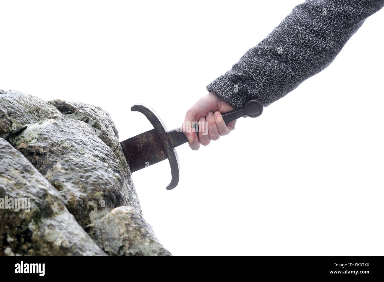 Hand of the valiant knight tries to remove the magical Excalibur sword ...