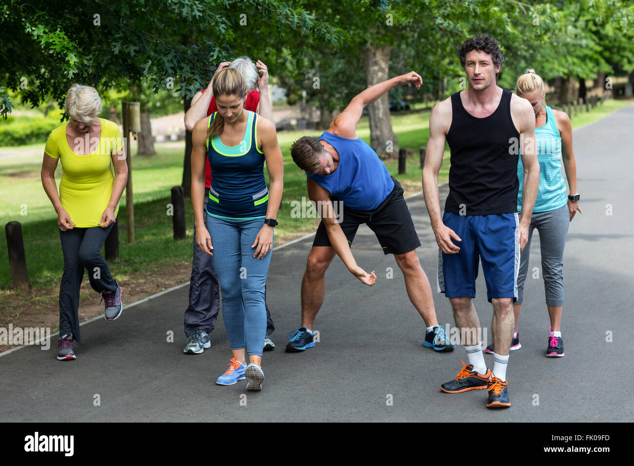 Marathon athletes stretching Stock Photo - Alamy