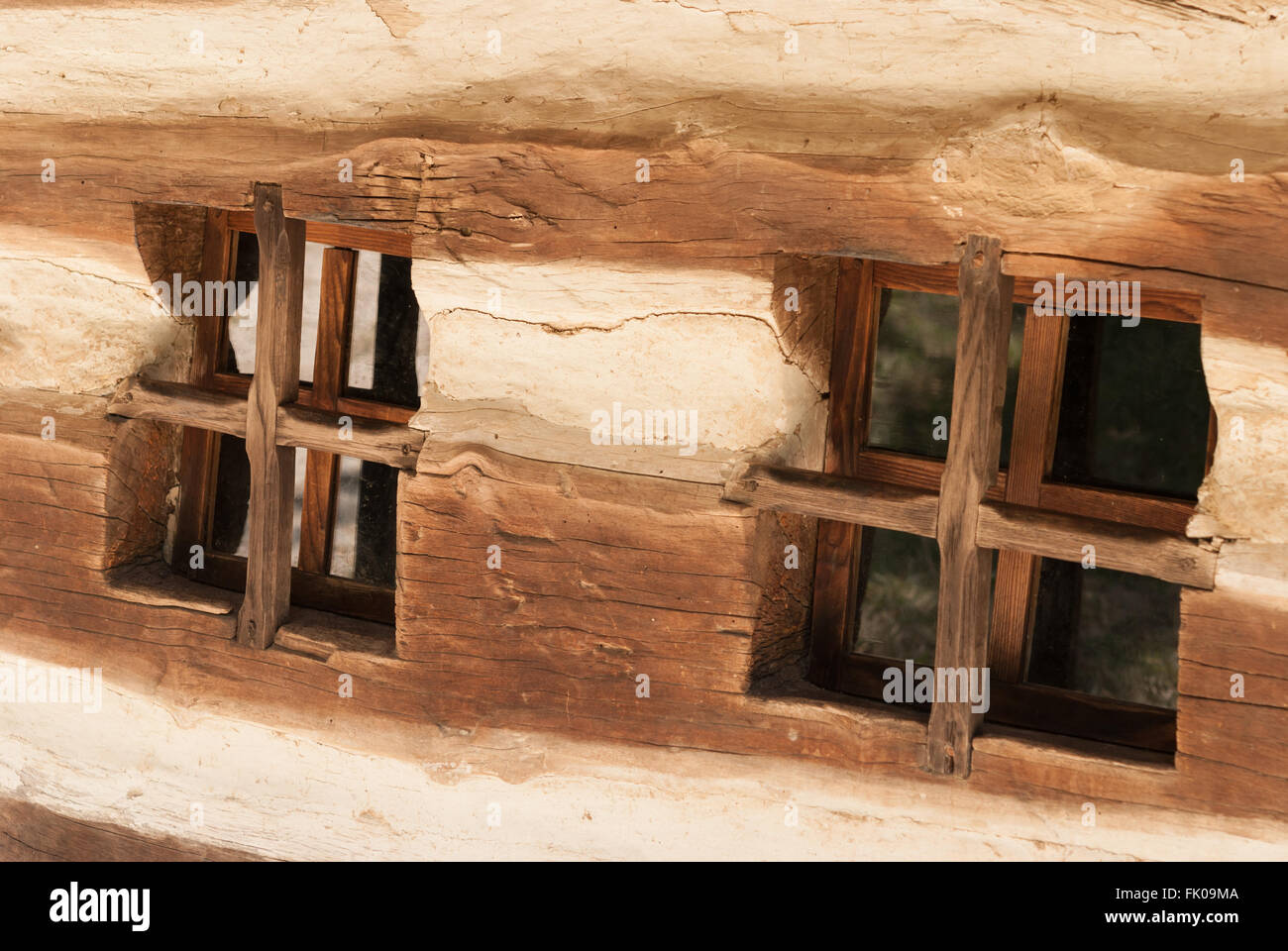 Windows of the old traditional Romanian wooden village house closeup ...