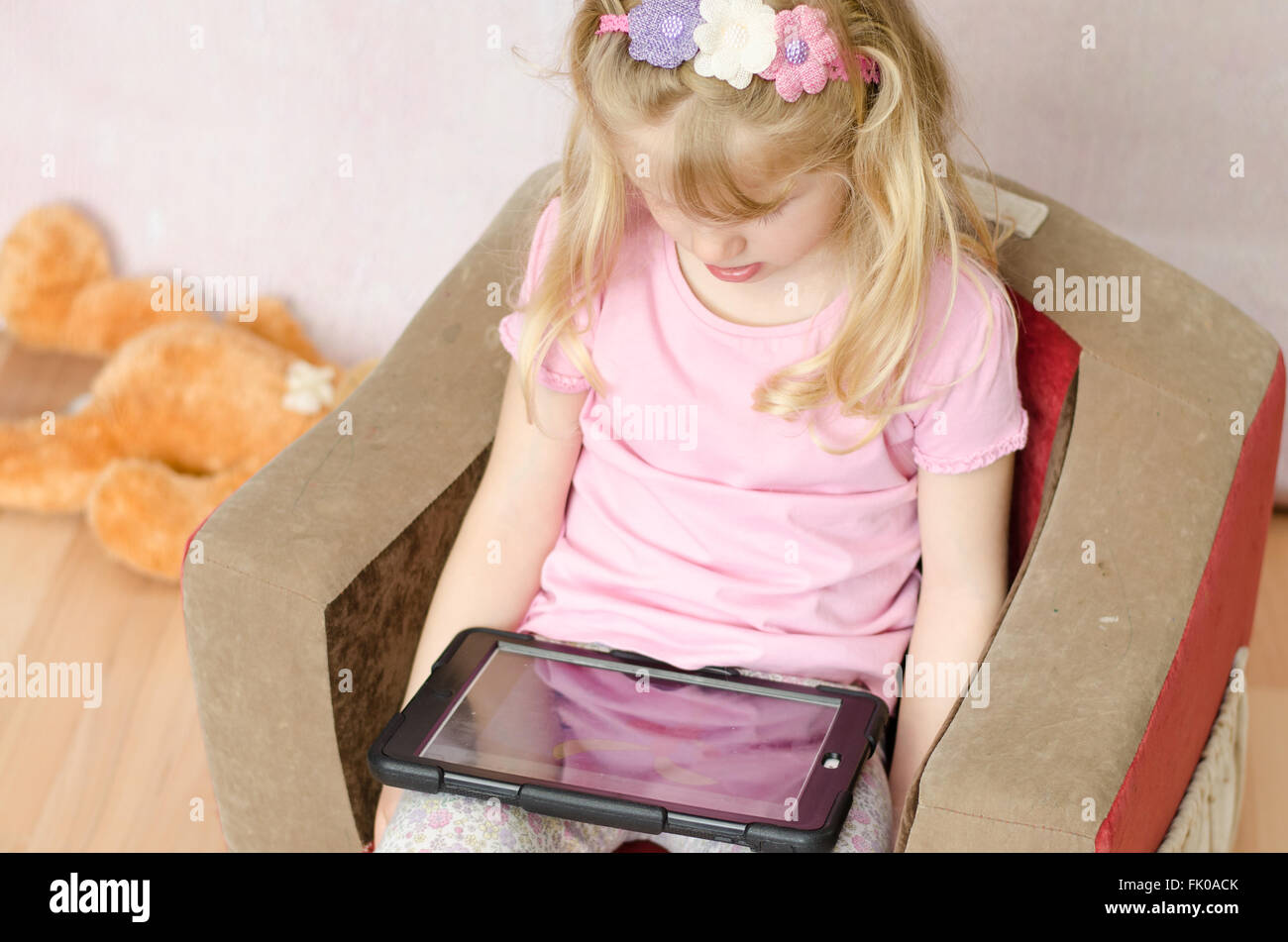 Child watching tablet hi-res stock photography and images - Alamy