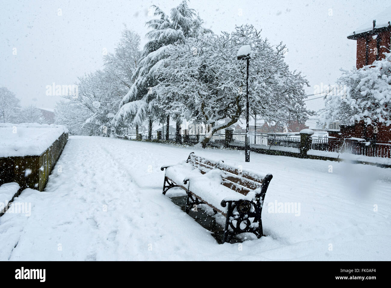 The grounds of Oldham Parish Church during a heavy snow fall, Oldham ...