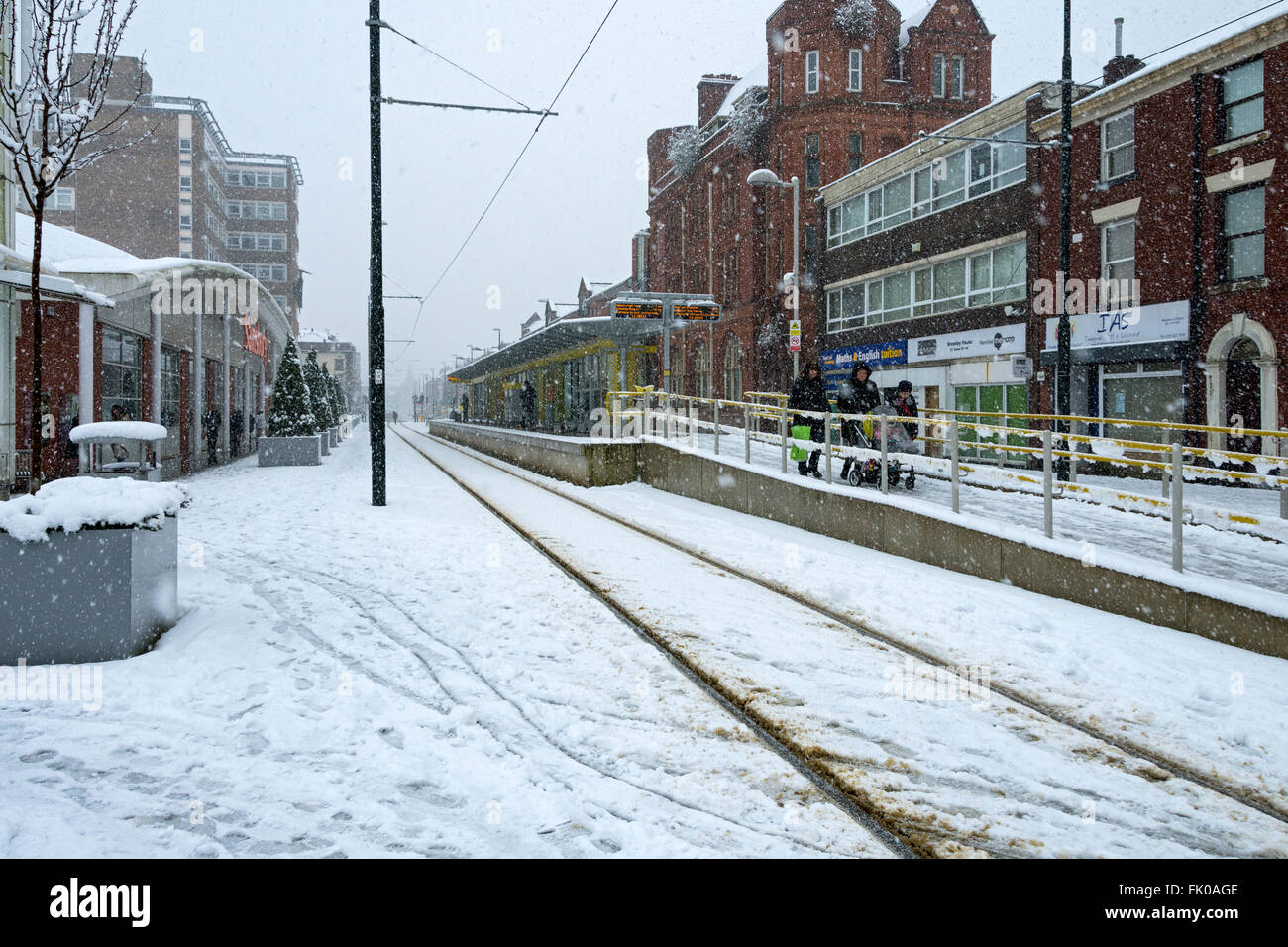 The Oldham Central Metrolink tram stop in heavy snow, Oldham, Greater ...