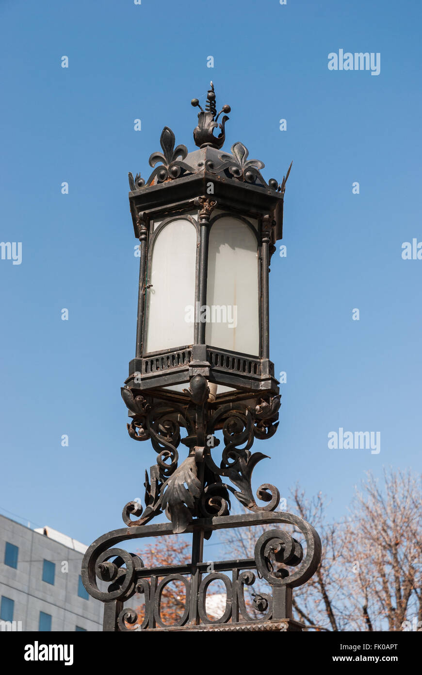 Old Lantern streetlights closeup with the blue sky as a background ...