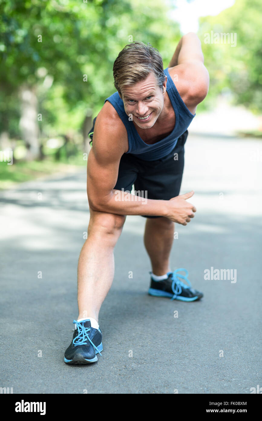 Legs stretching sportsman adult hi-res stock photography and images - Alamy