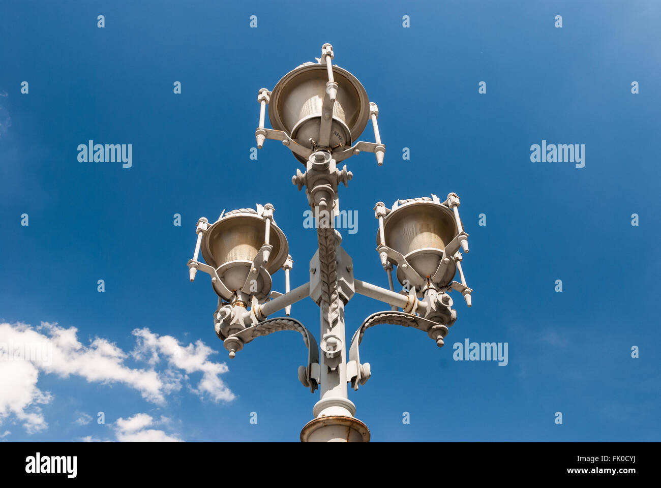 Old Lantern streetlights closeup with the blue sky as a background ...