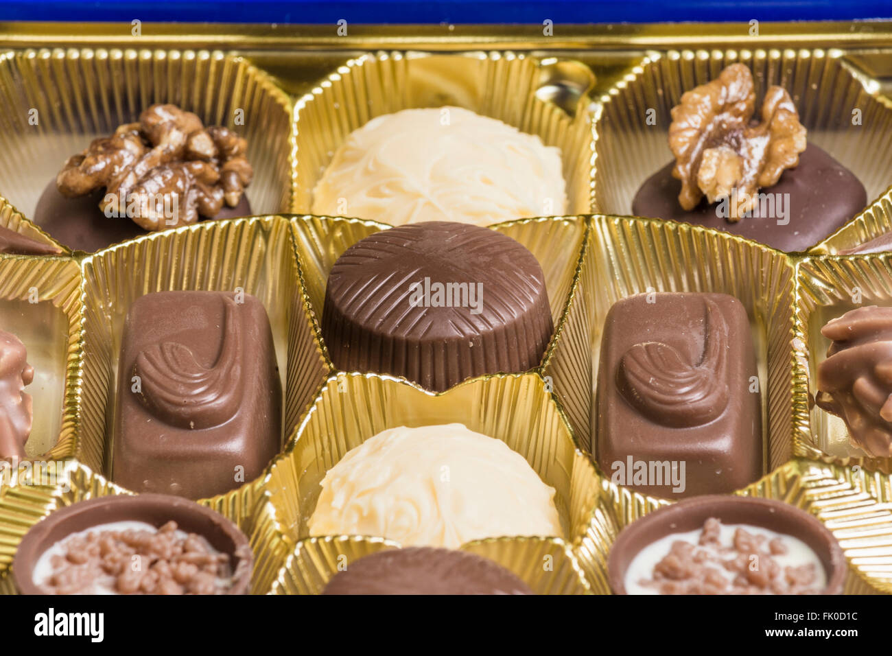 Chocolate pralines of various types in a box Stock Photo - Alamy