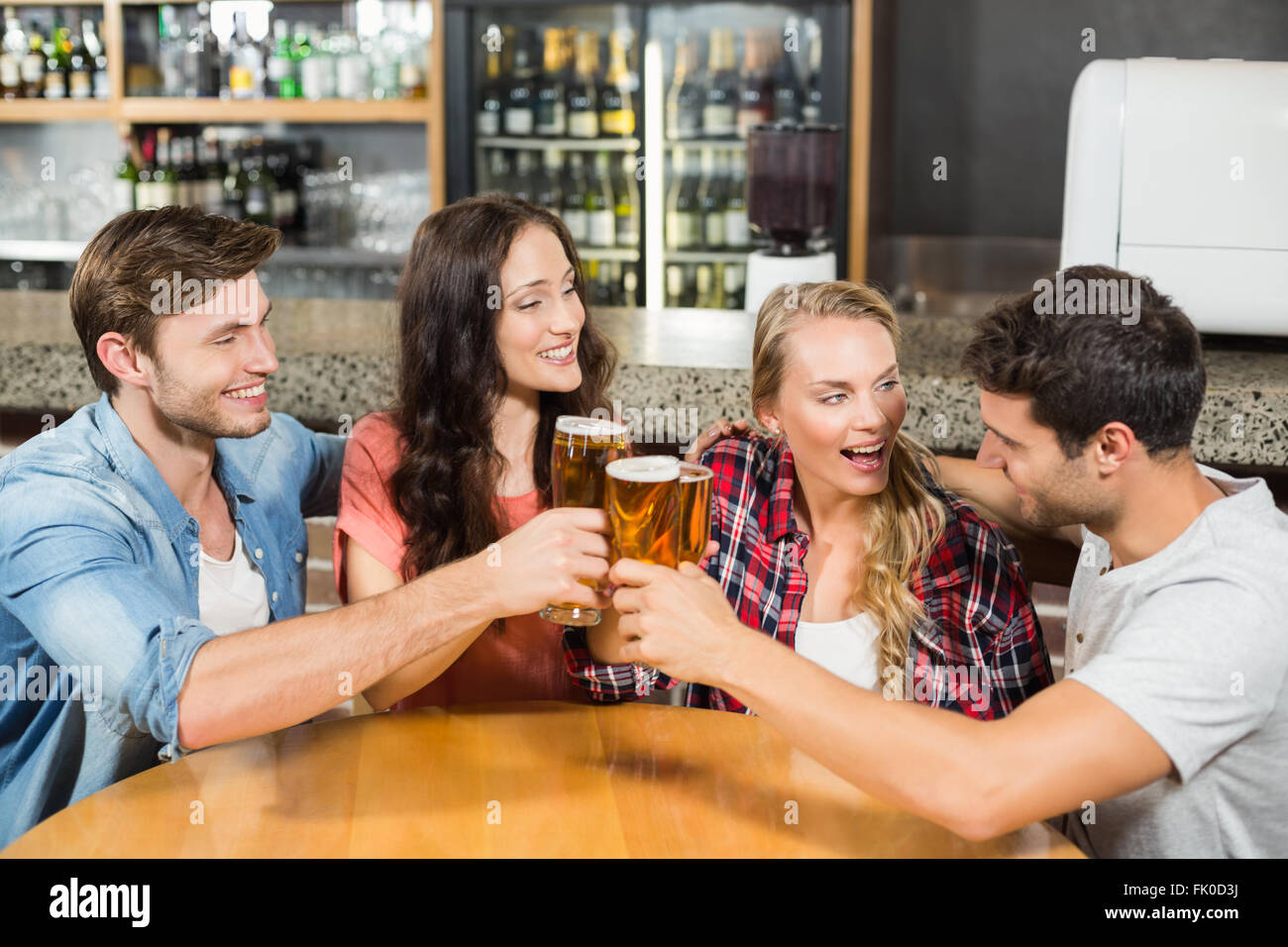 Couple toasting beers hi-res stock photography and images - Alamy