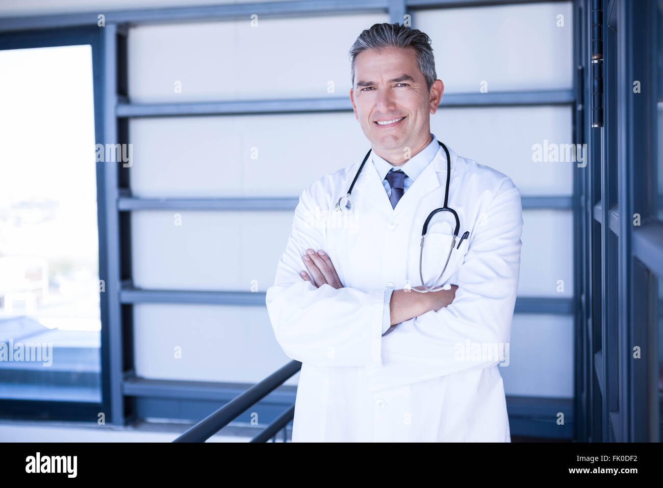 Happy male doctor hi-res stock photography and images - Alamy