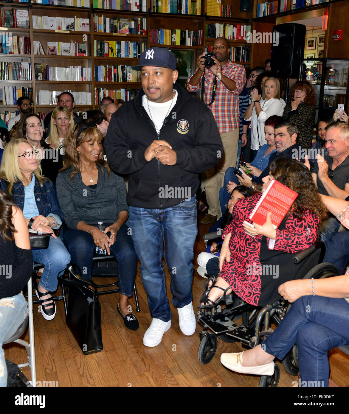 Daymond John greets fans and signs copies of his book 'The Power of ...