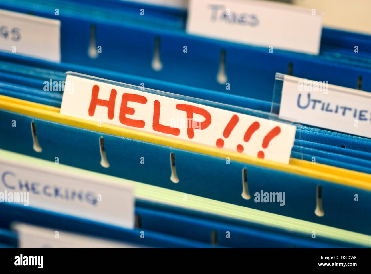 Hanging file folder labeled with help hi-res stock photography and ...