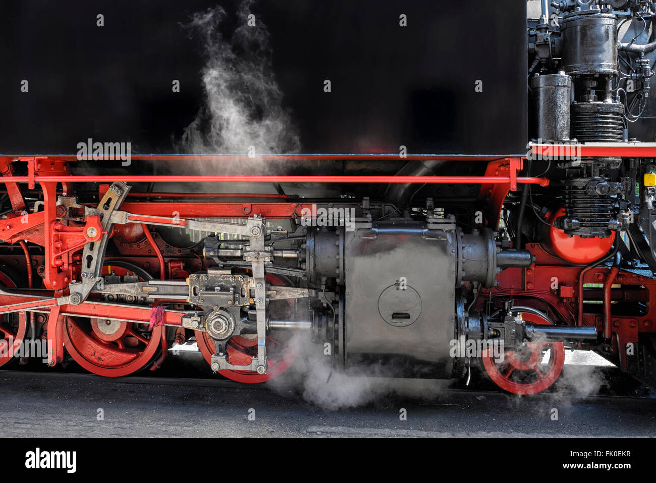 Vintage steam train leaving the station Stock Photo - Alamy