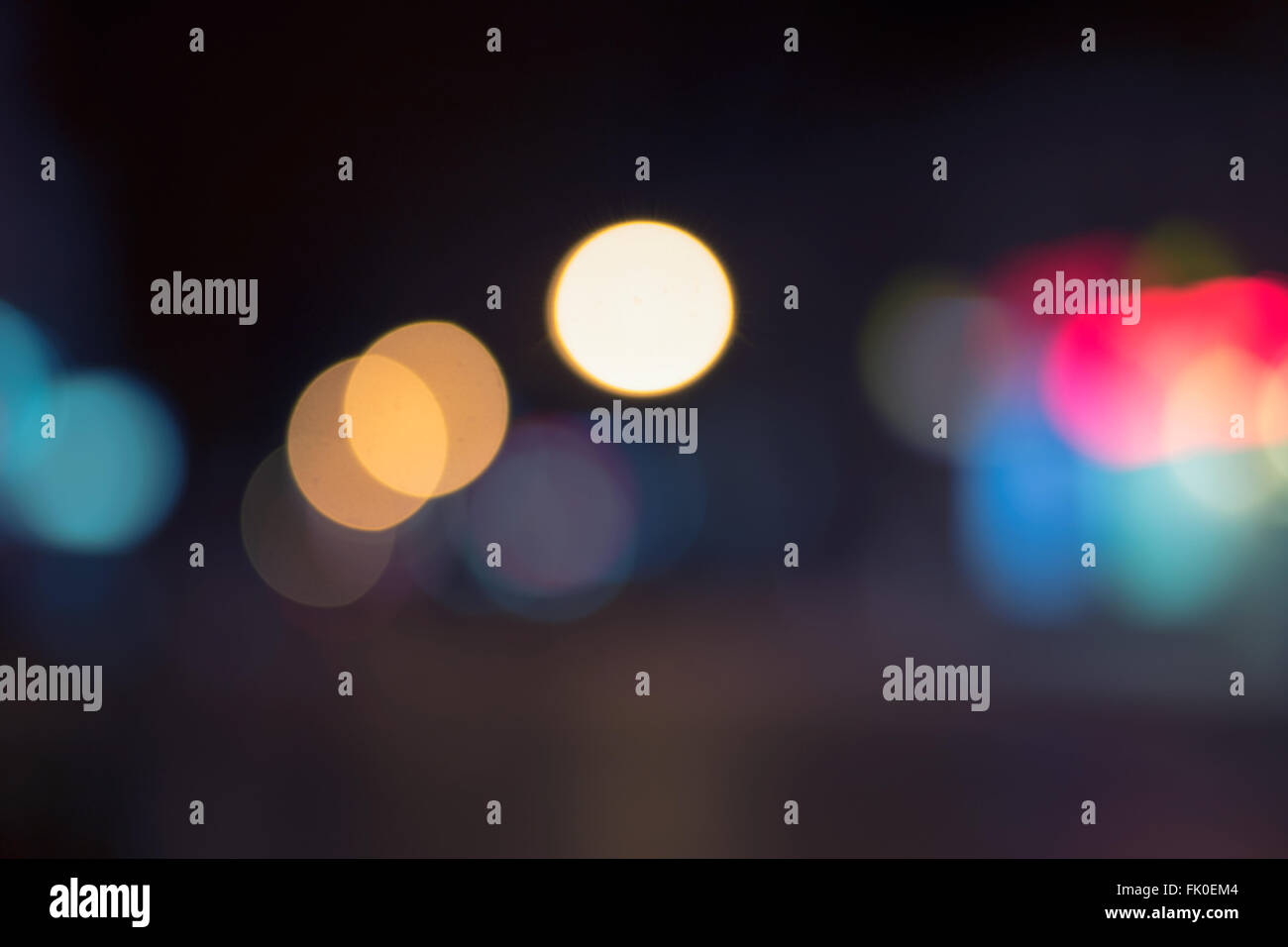 Beautiful defocused lights background on dark Stock Photo - Alamy