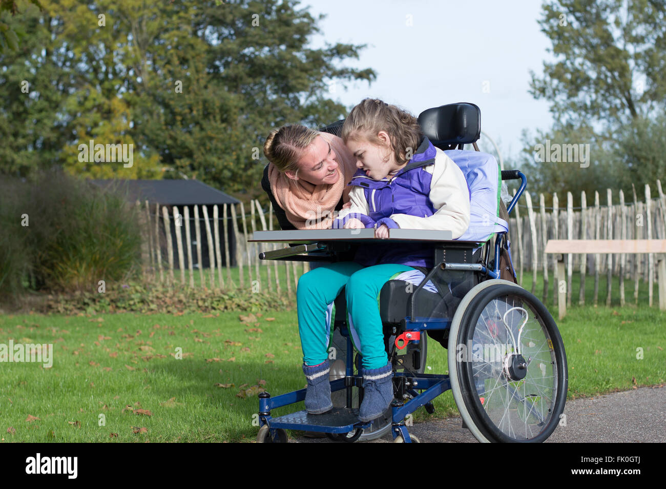 Child in wheelchair hi-res stock photography and images - Alamy