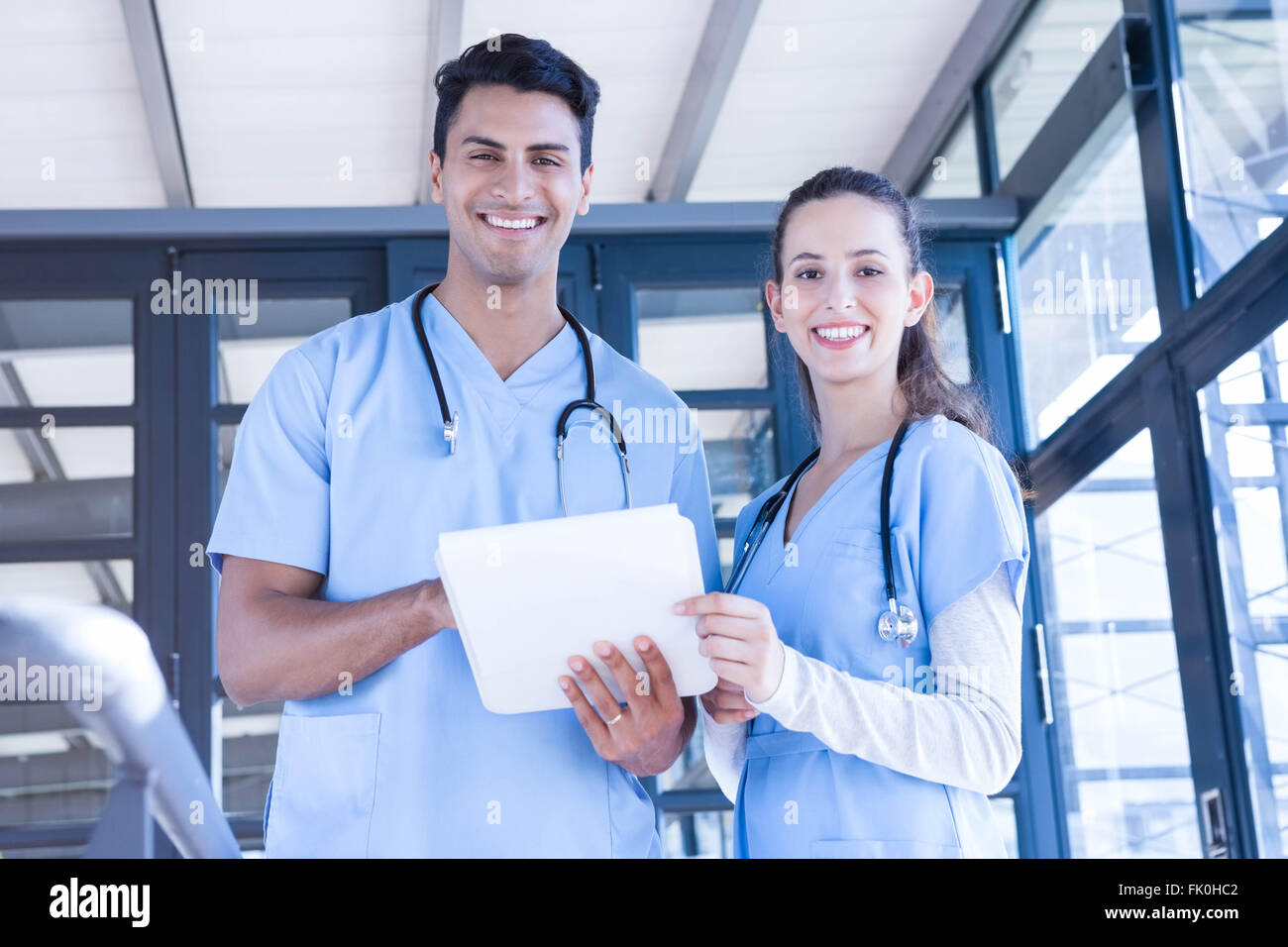 Medical team talking at the hospital Stock Photo - Alamy