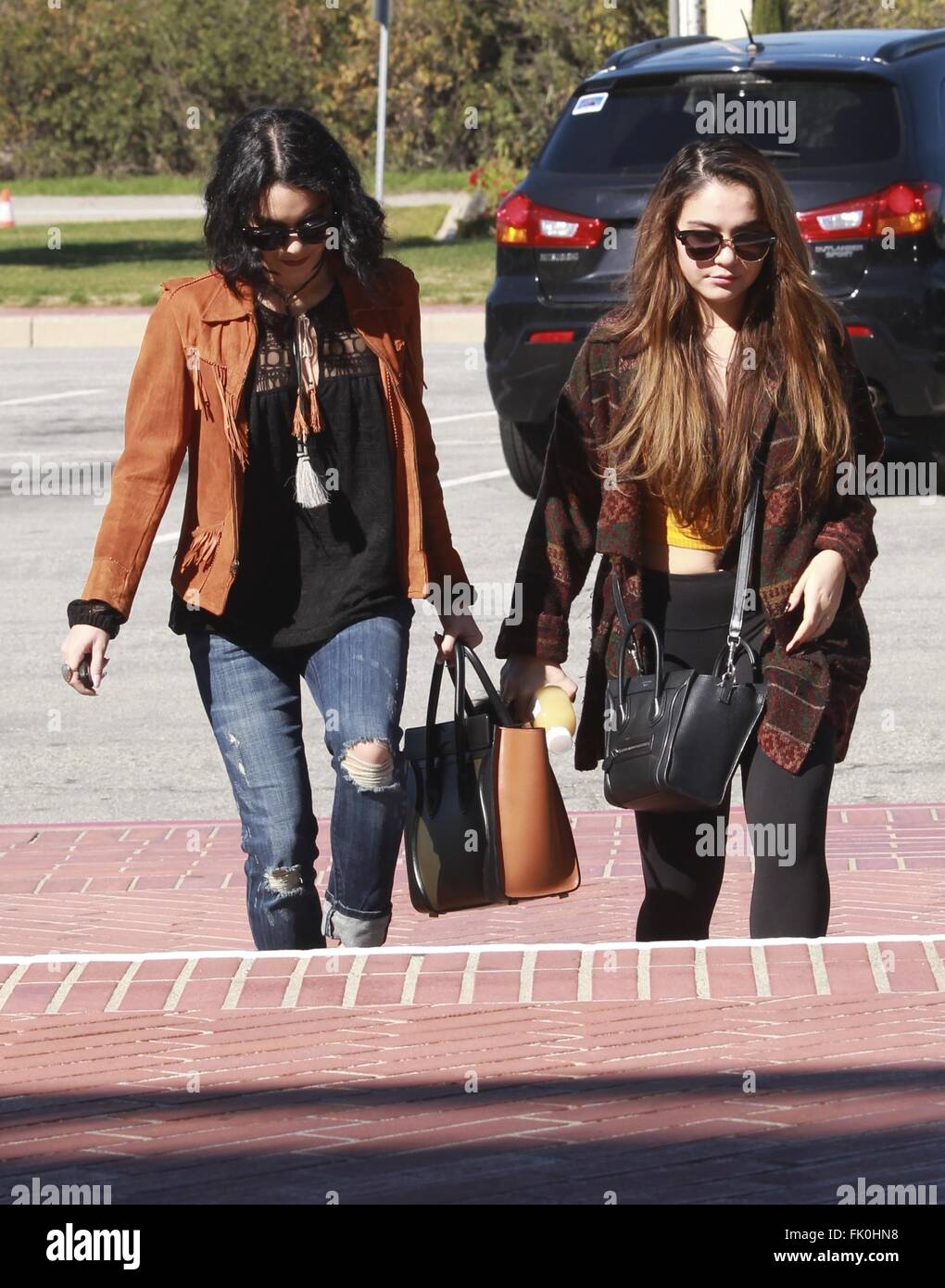 Vanessa Hudgens and her sister Stella arrive at Forest Lawn Memorial ...